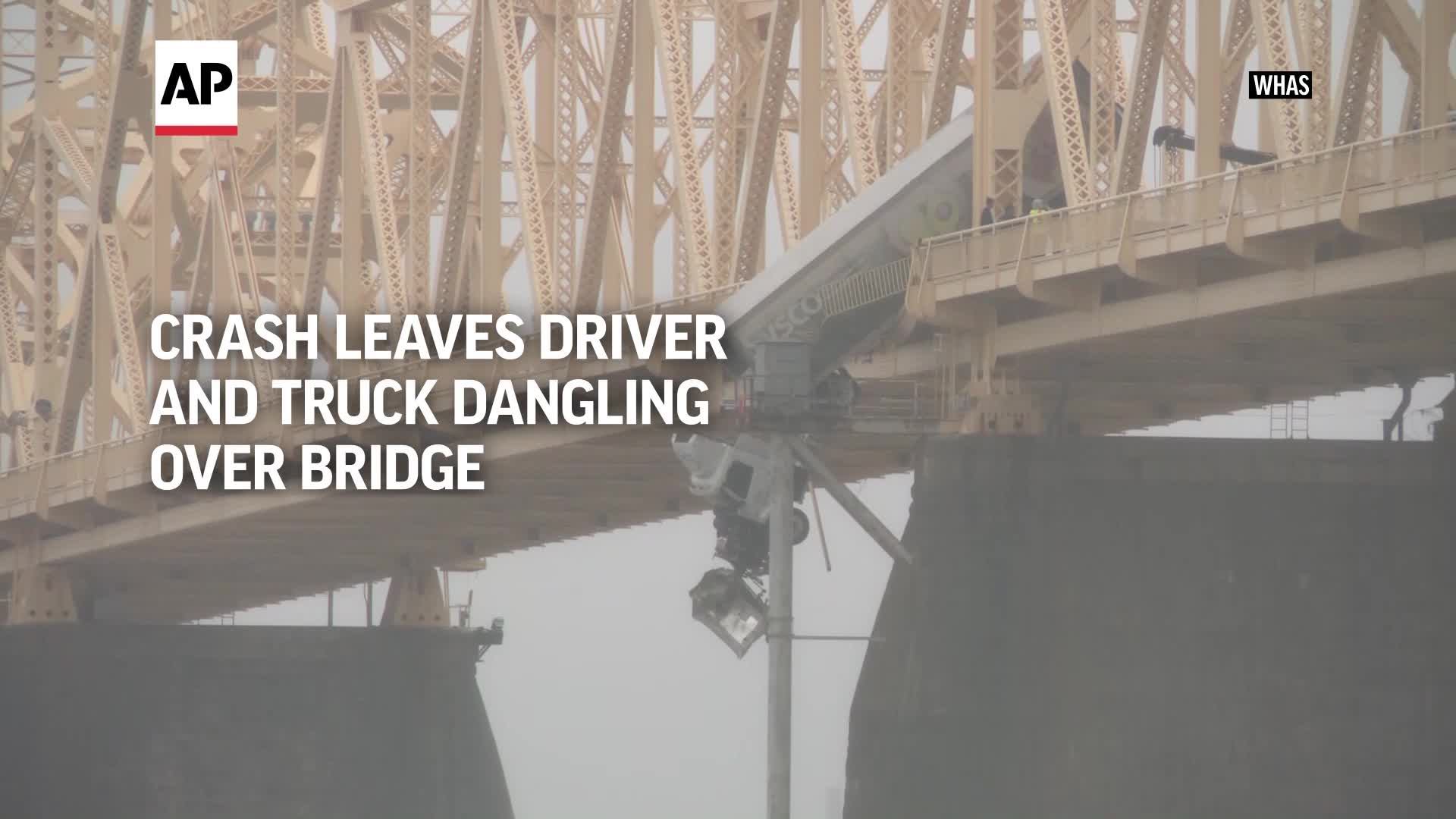 Crash leaves driver and truck dangling over bridge – WFLA