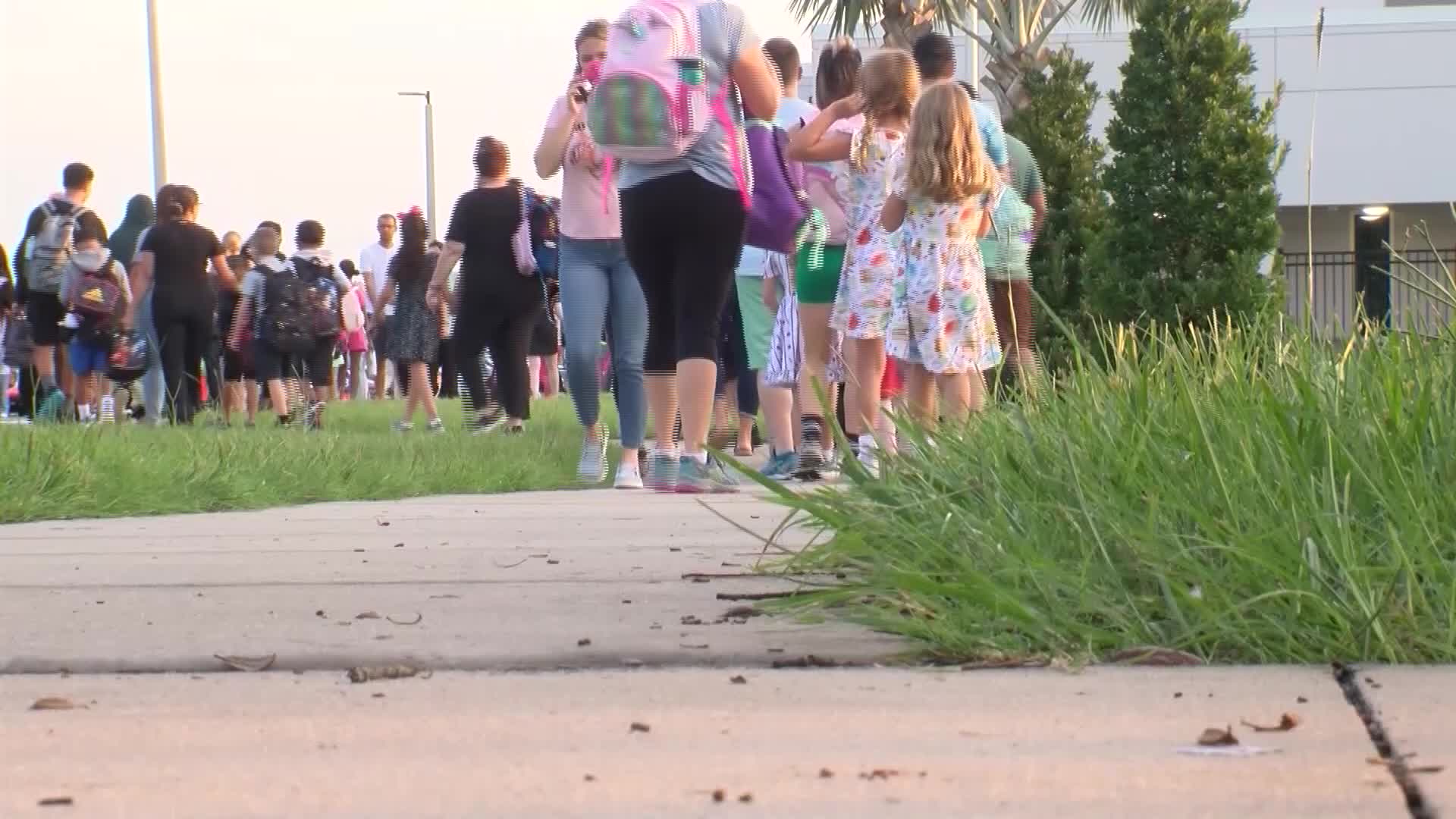 Dozens of volunteers spent their morning building 15,000 backpacks for ...