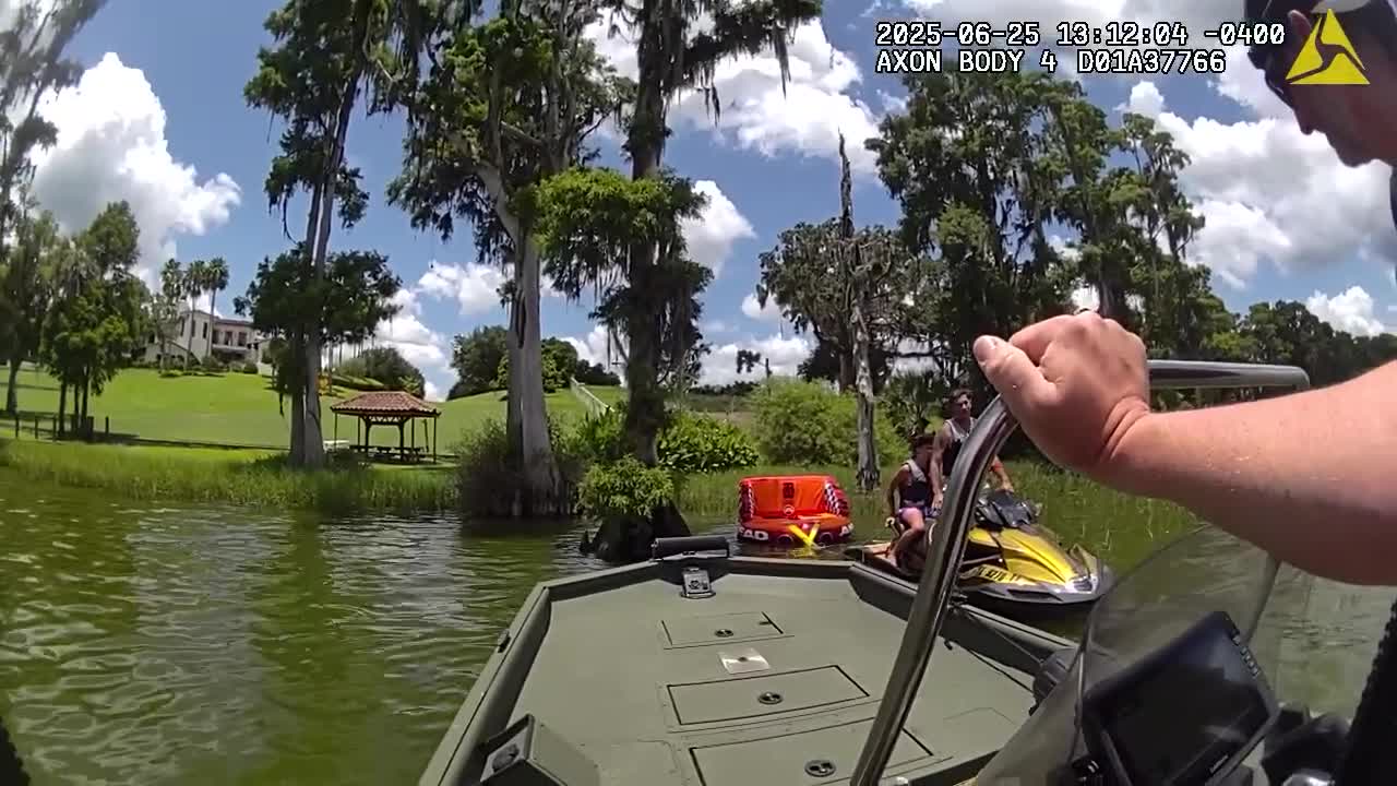 Father, son rescued after jet ski breaks down in alligator-infested ...