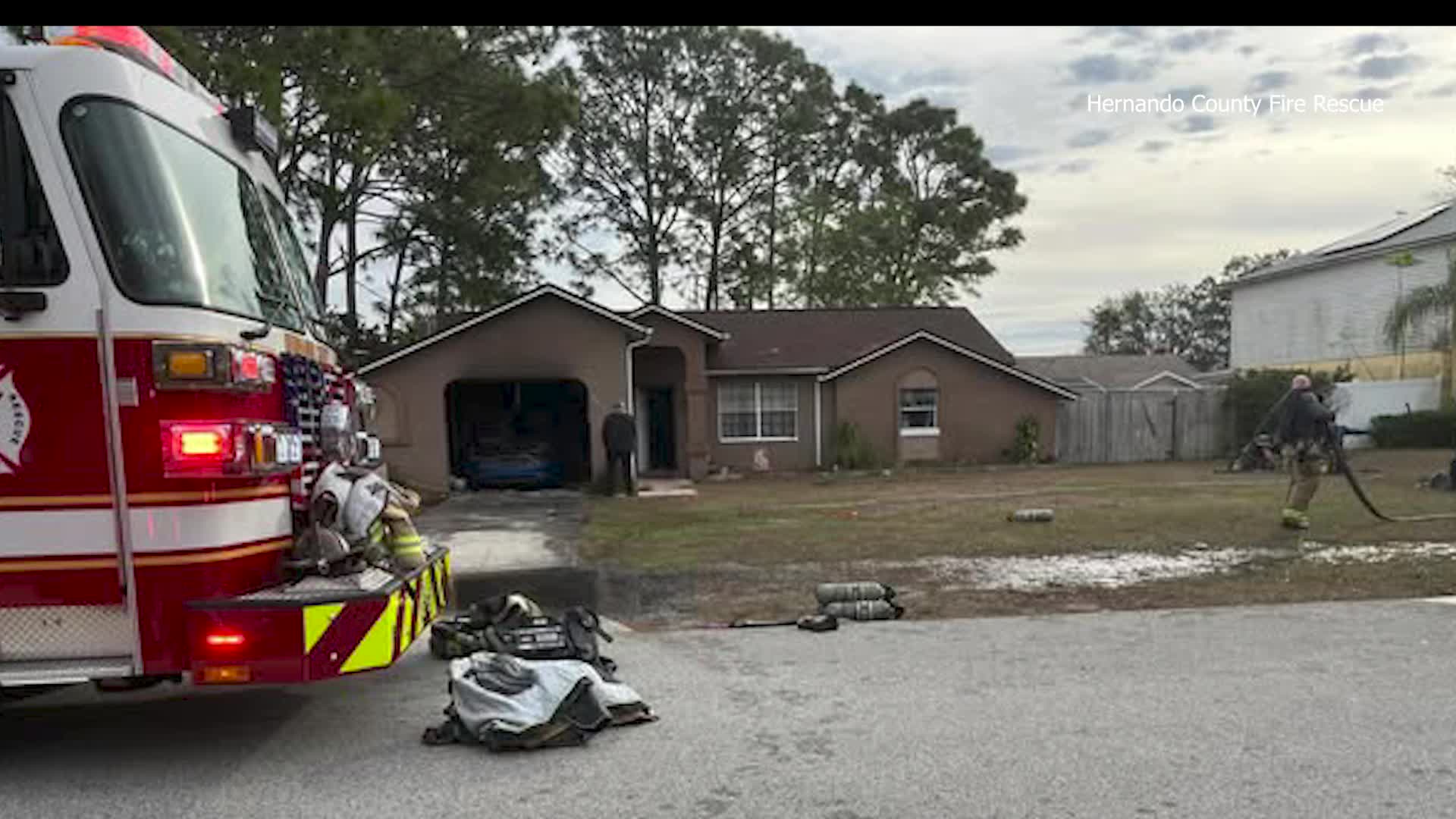 Spring Hill fire damages car as crews rescue 3 cats inside – WFLA