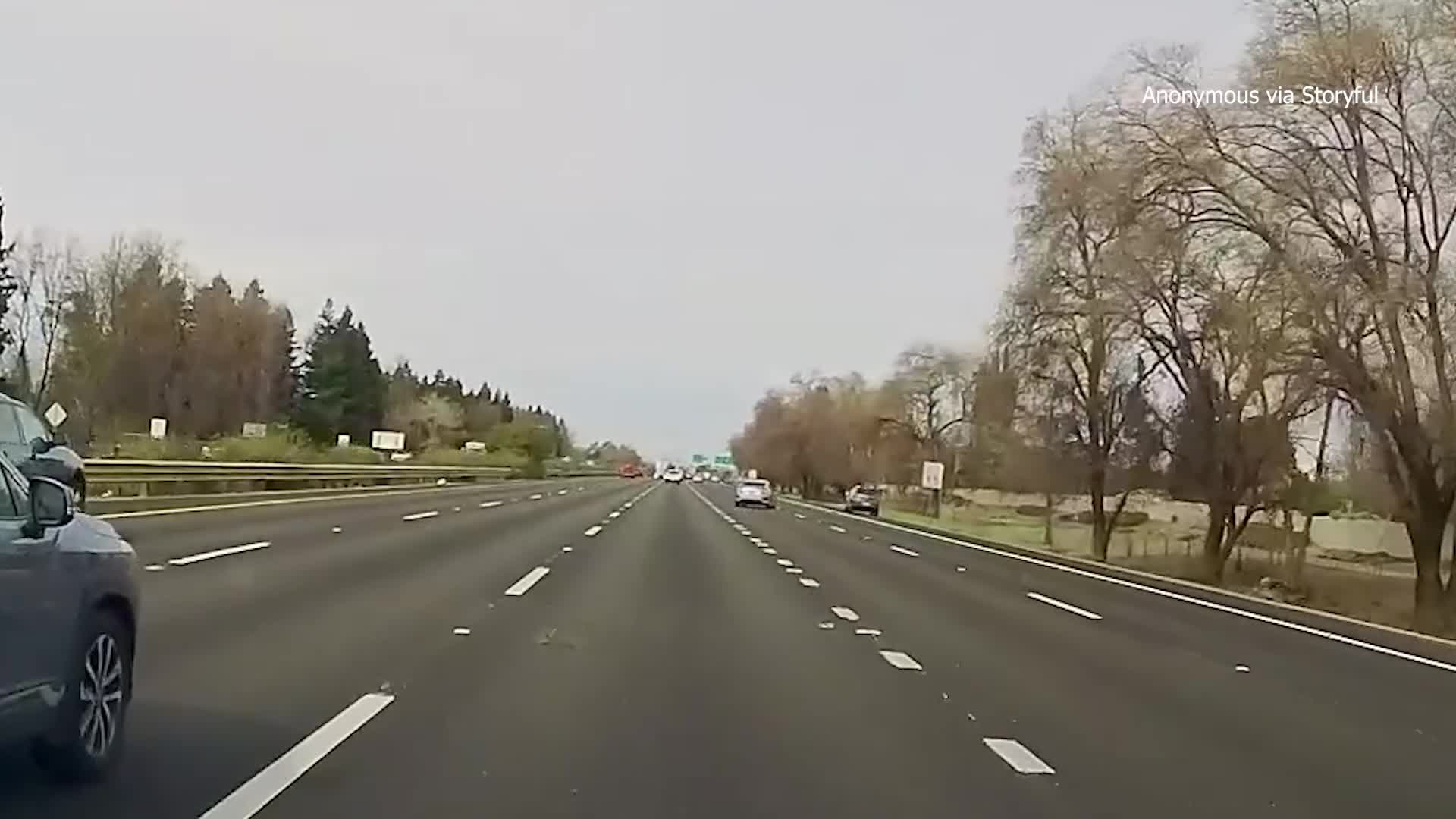 Motorists’ lucky escape as car launches off overpass onto freeway below ...