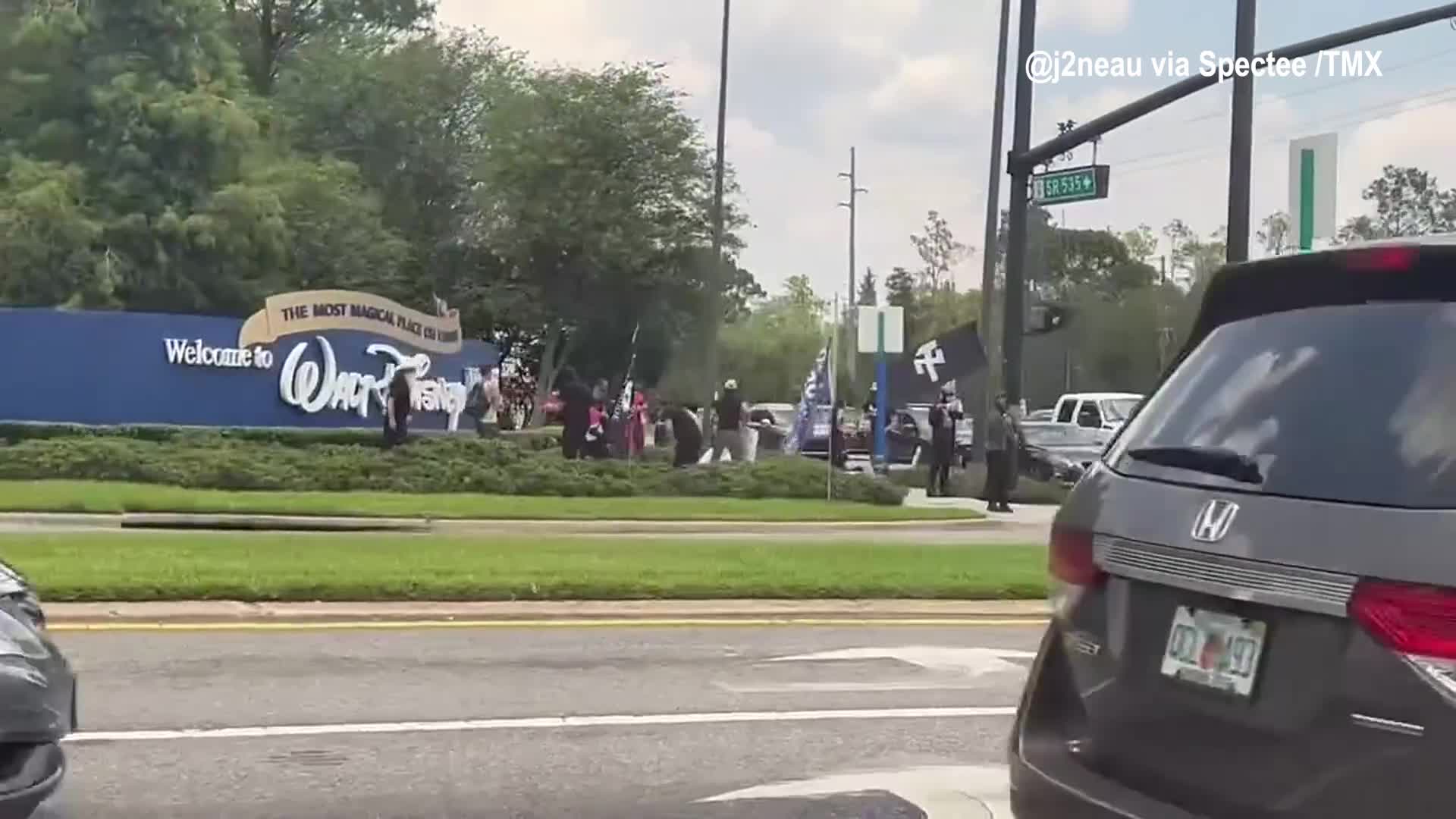 WATCH: Protesters wave Nazi flags outside Disney World entrance – WFLA