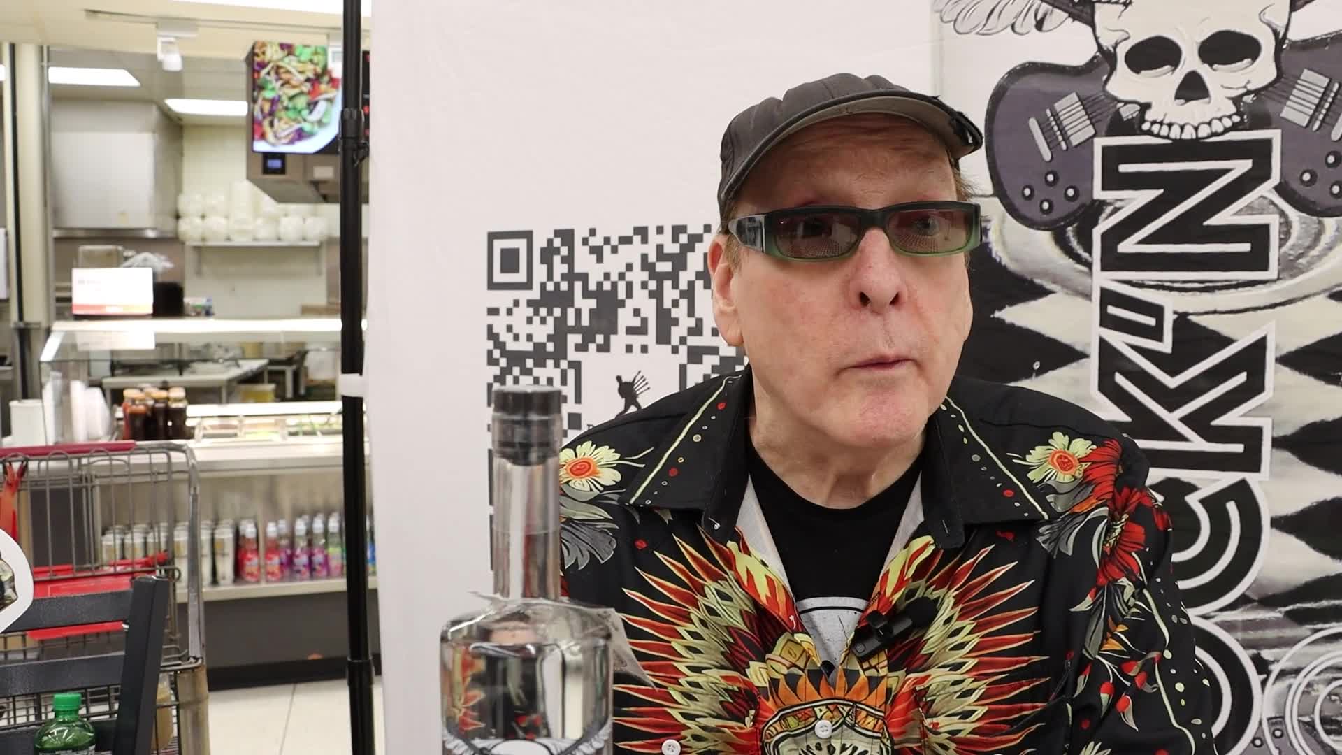 12 20 2024 Cheap Trick’s Rick Nielsen signs bottles of his vodka at ...