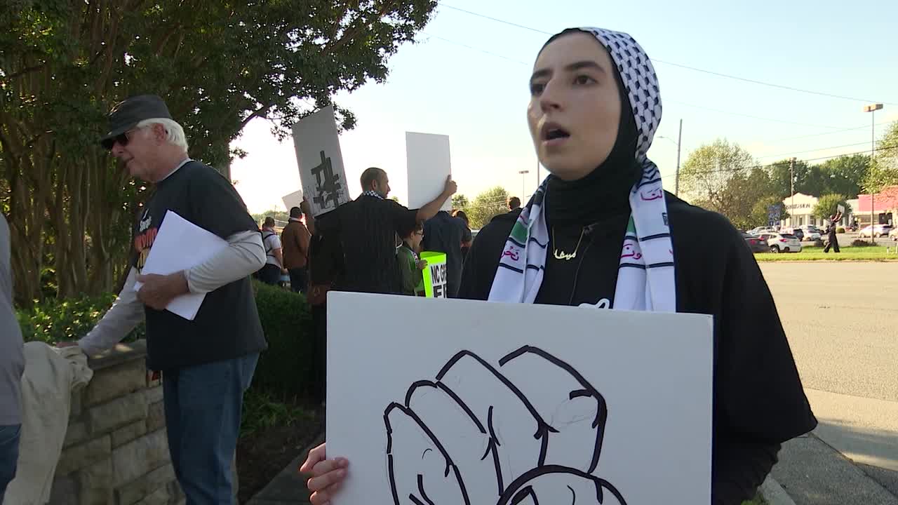 Community leader speaks at Greensboro protest in solidarity with ...